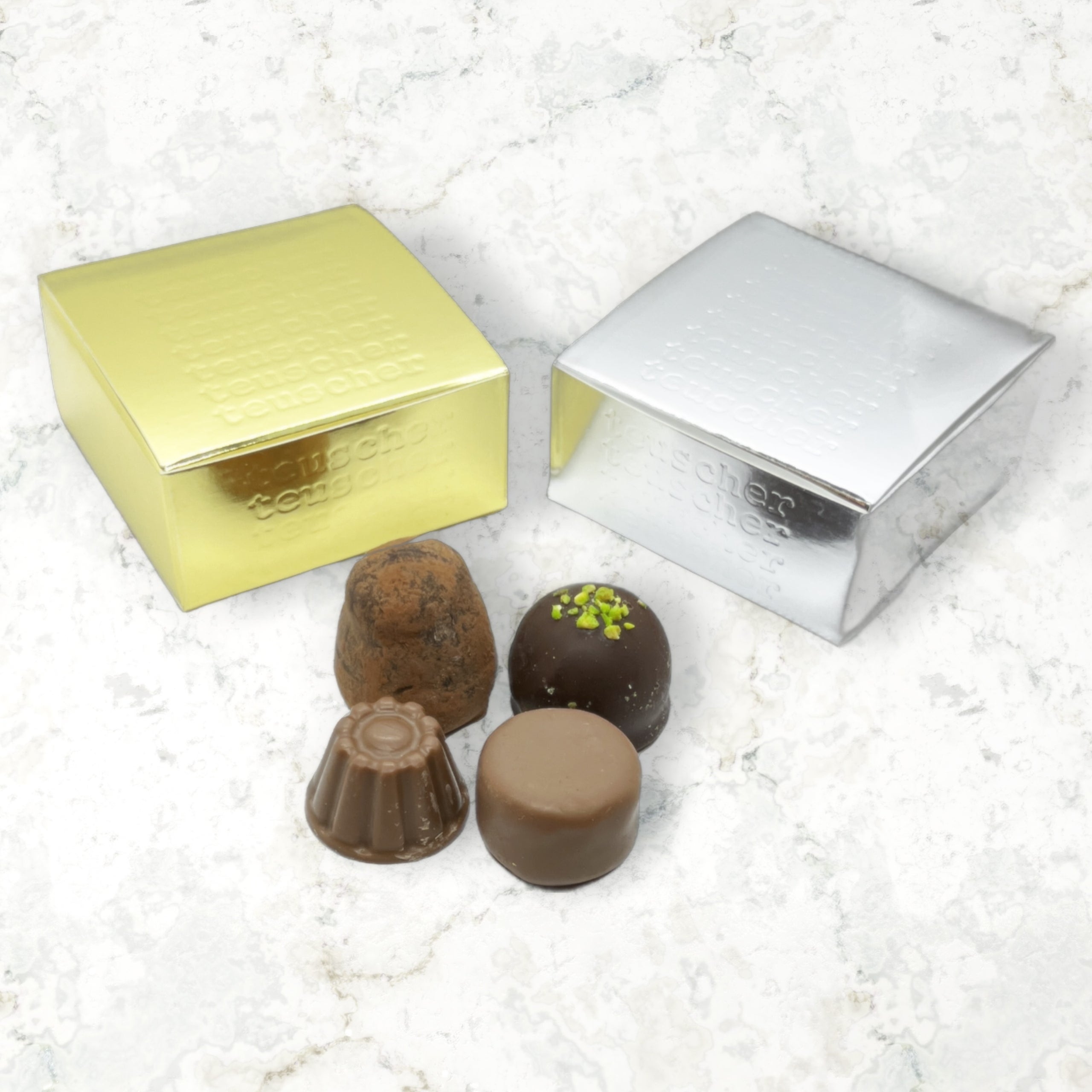 4 pieces Silver Truffle Box | Teuscher San Diego